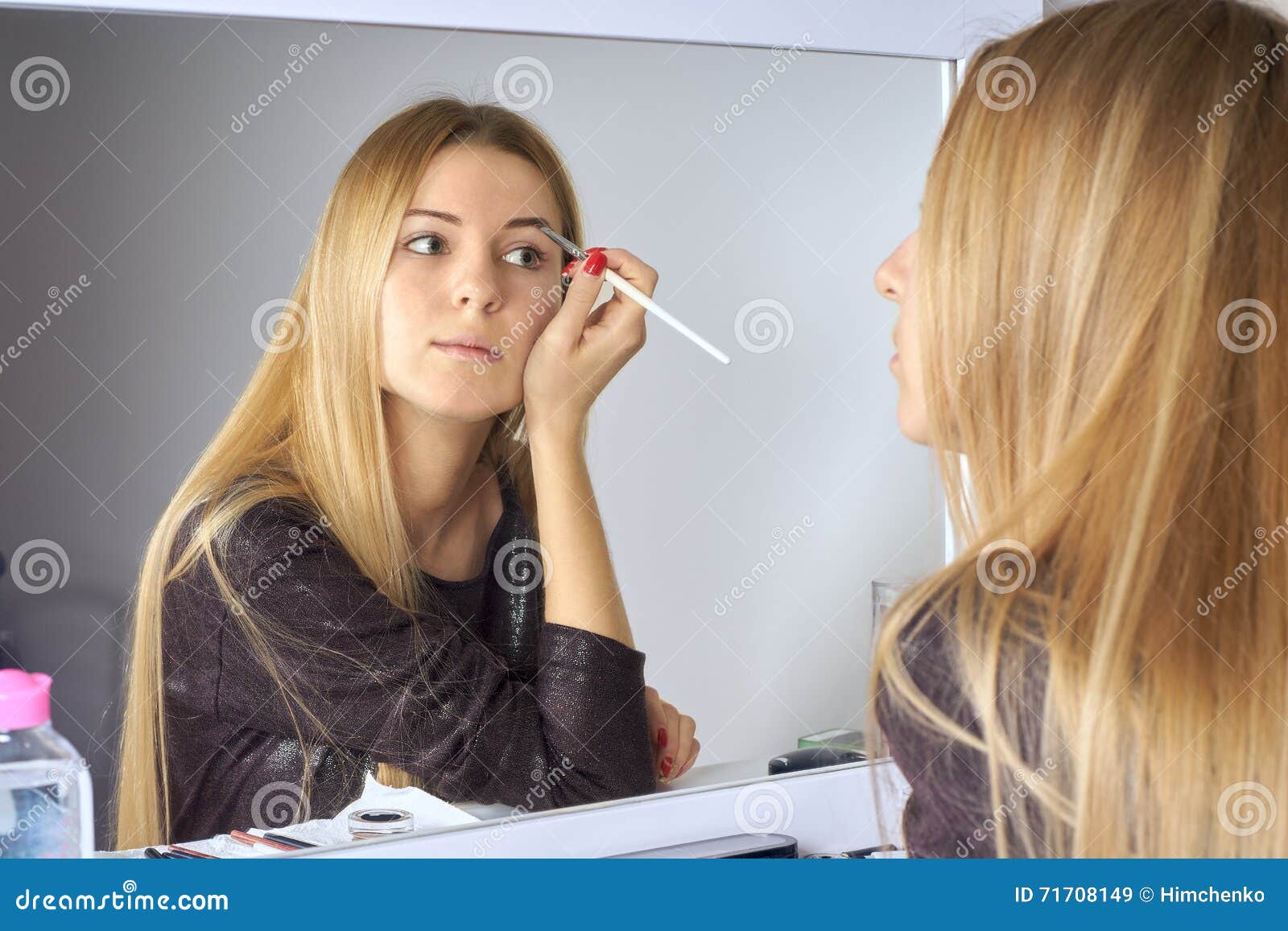 Reflection of Young Beautiful Woman Applying Her Make-up Stock Image ...