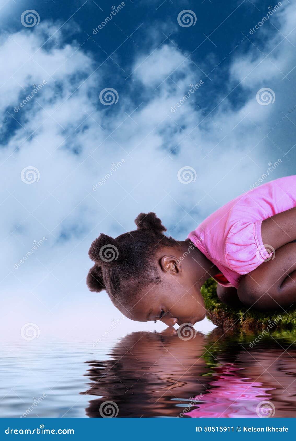 Reflections of an African Girl Drinking from a River Stock Image ...