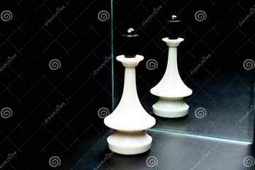 Reflections of Chess Pieces in the Mirror Stock Image - Image of ...