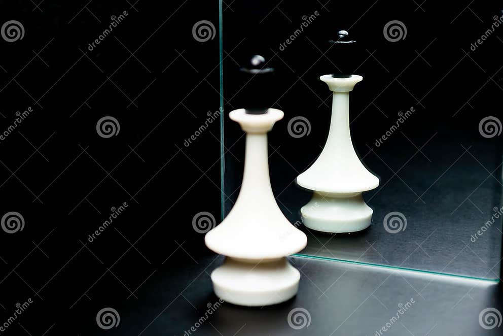 Reflections of Chess Pieces in the Mirror Stock Image - Image of ...