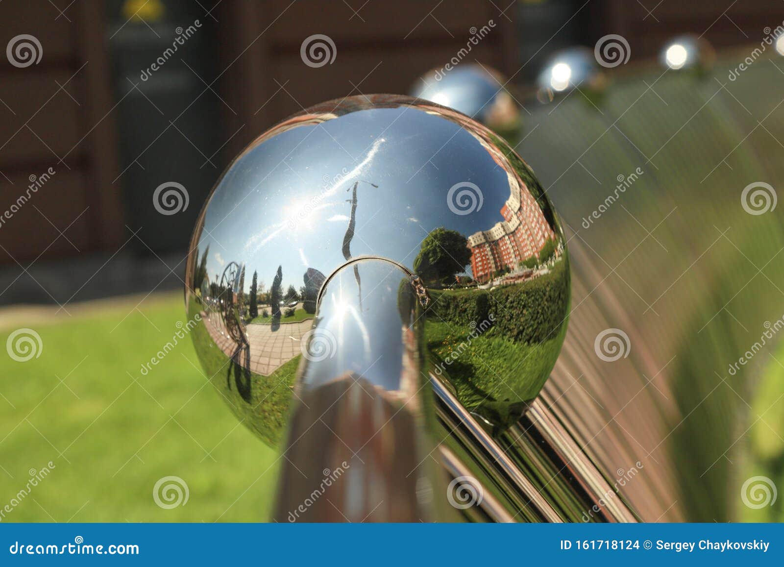 Reflections of the City in a Metal Ball Stock Photo - Image of form ...