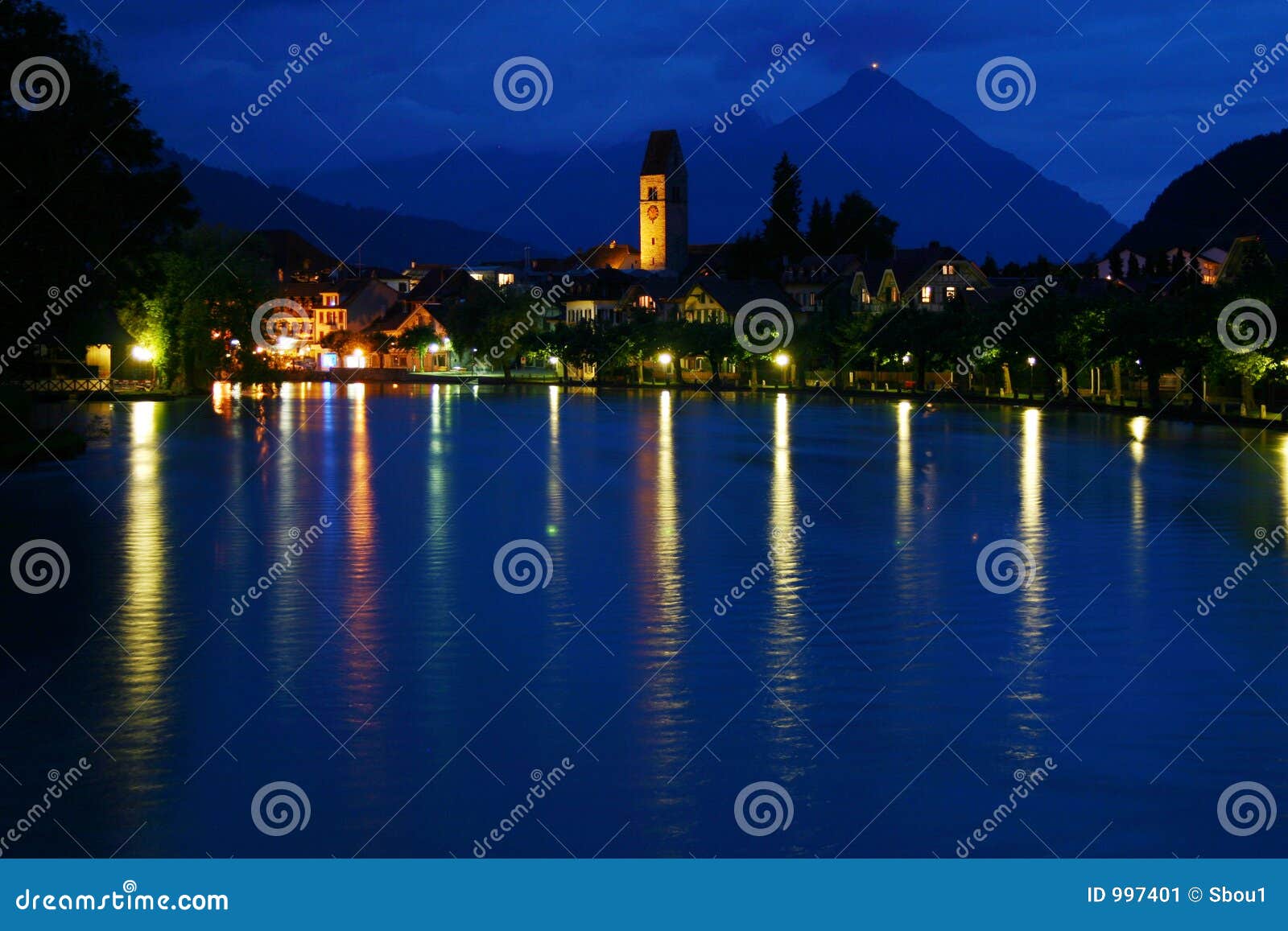 Reflections of Interlaken stock image. Image of belltower - 997401