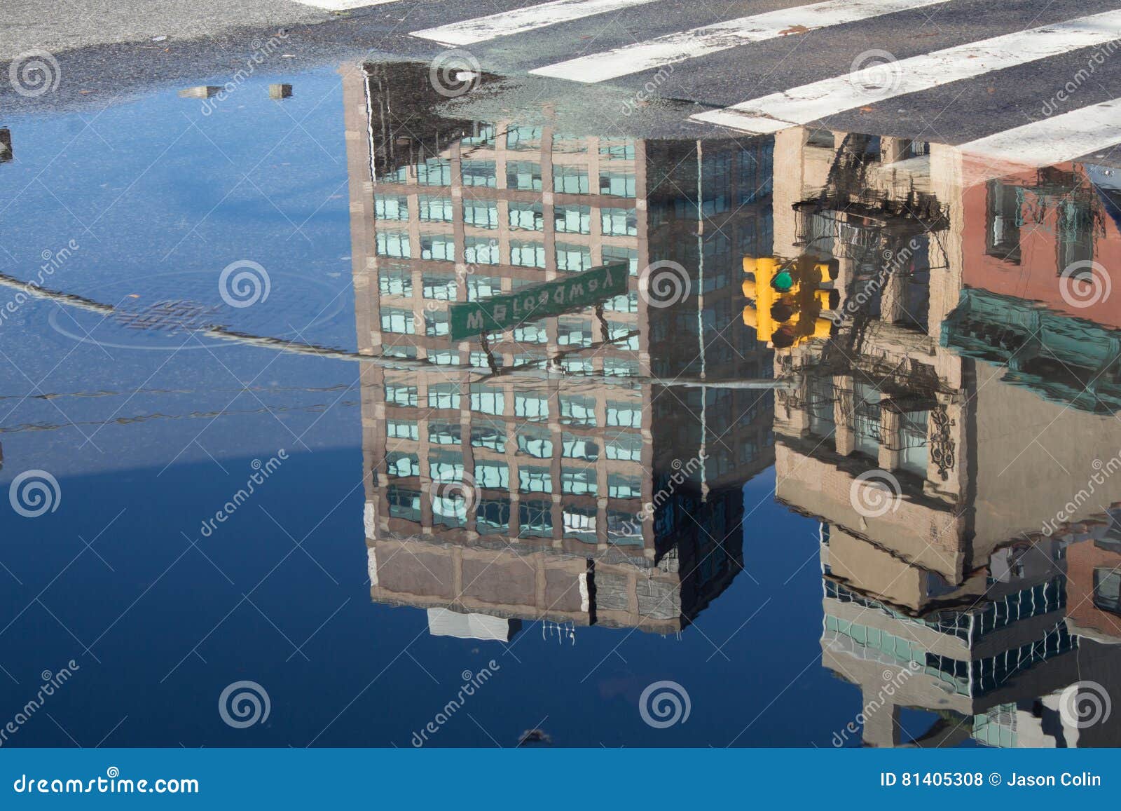 Reflections of New York City in a Puddle of Water Stock Photo - Image ...