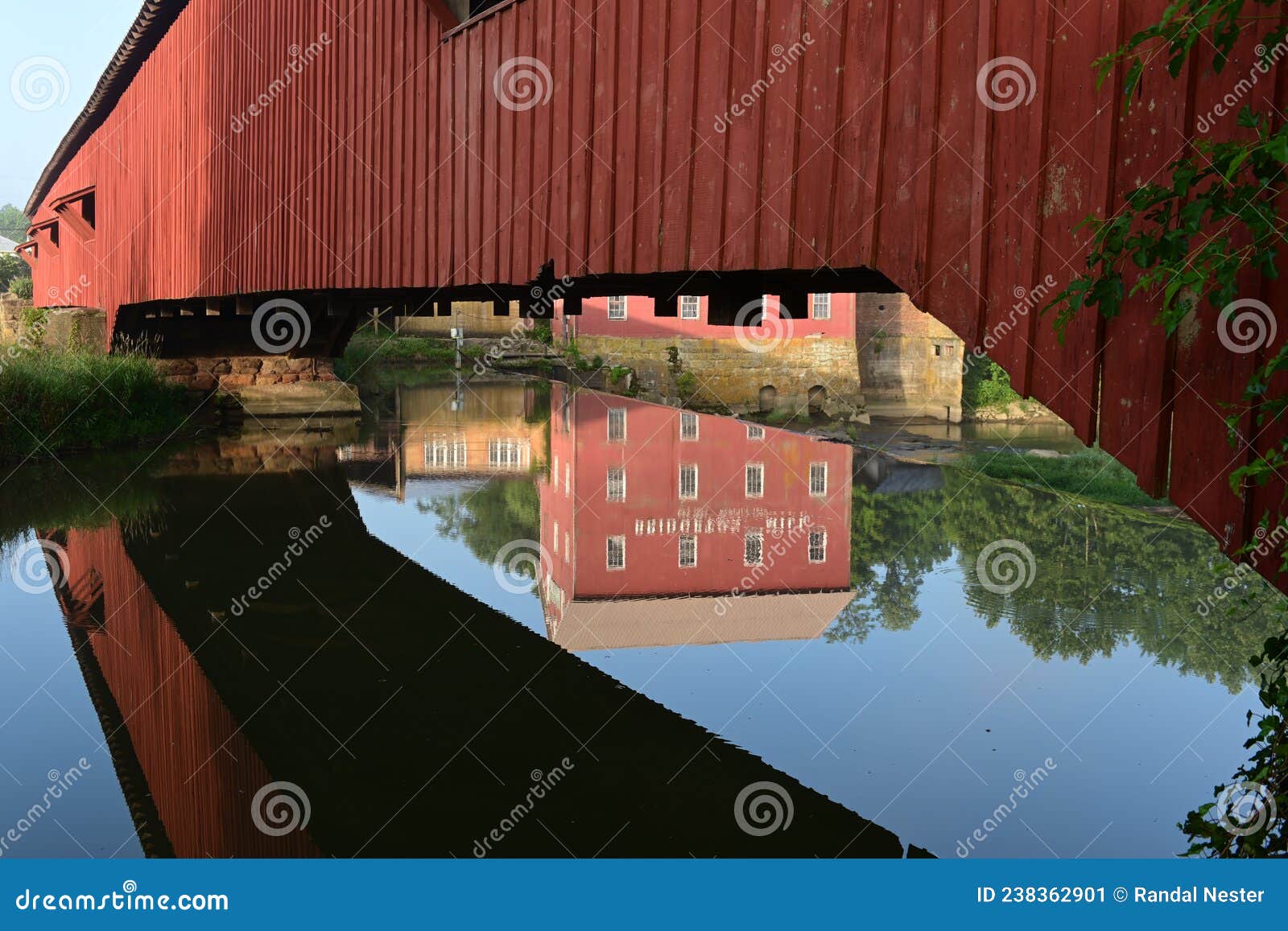 Reflections of an Old Mill Town Stock Image - Image of vehicle, roof ...