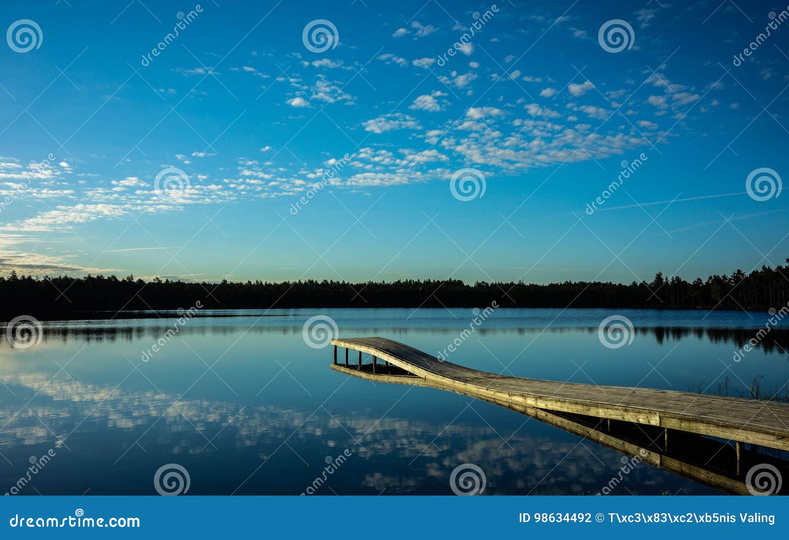 Reflections and the pier stock photo. Image of blue, scenery - 98634492