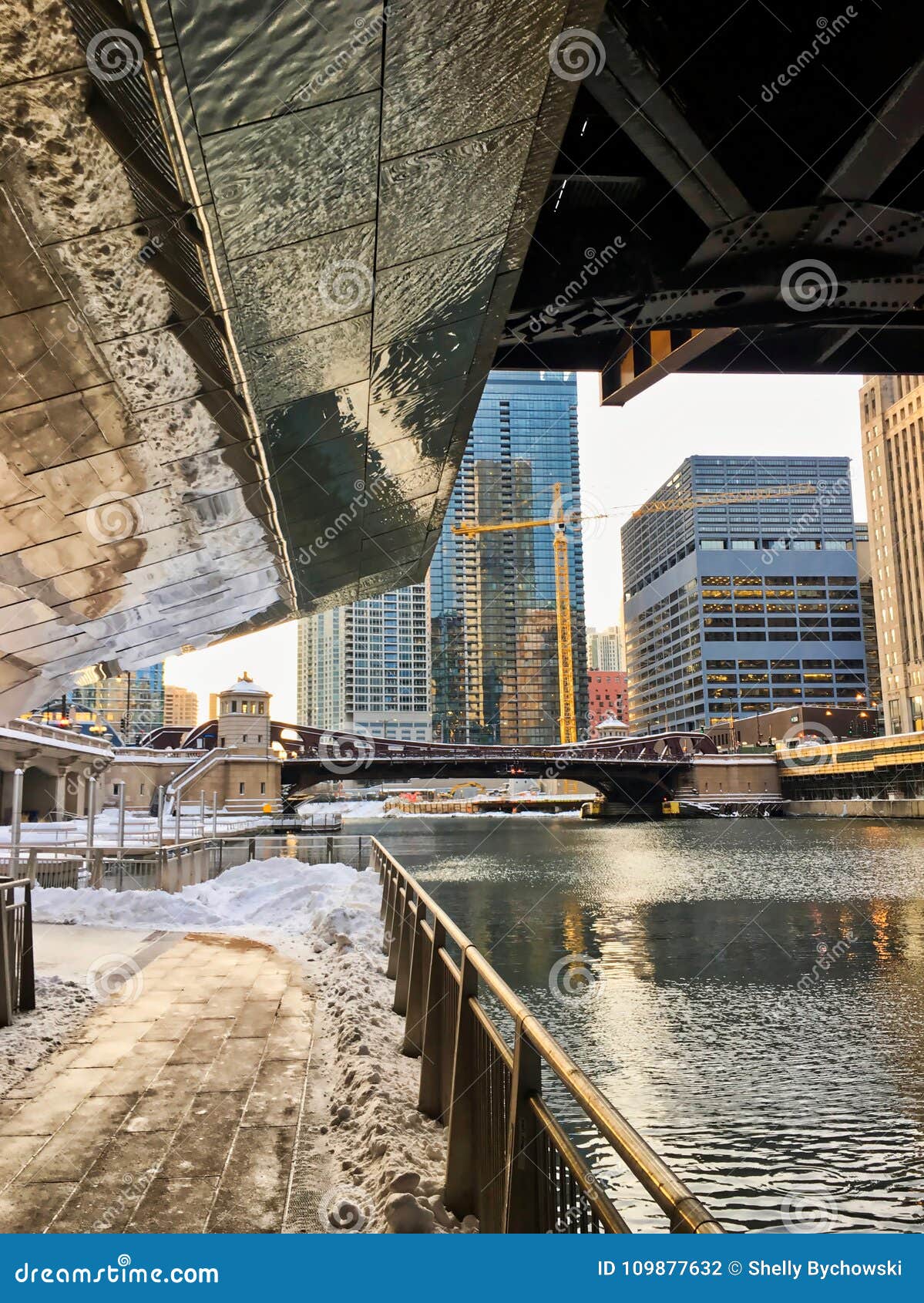 Reflections of Snow Covered Chicago Loop Along the Riverwalk of the ...