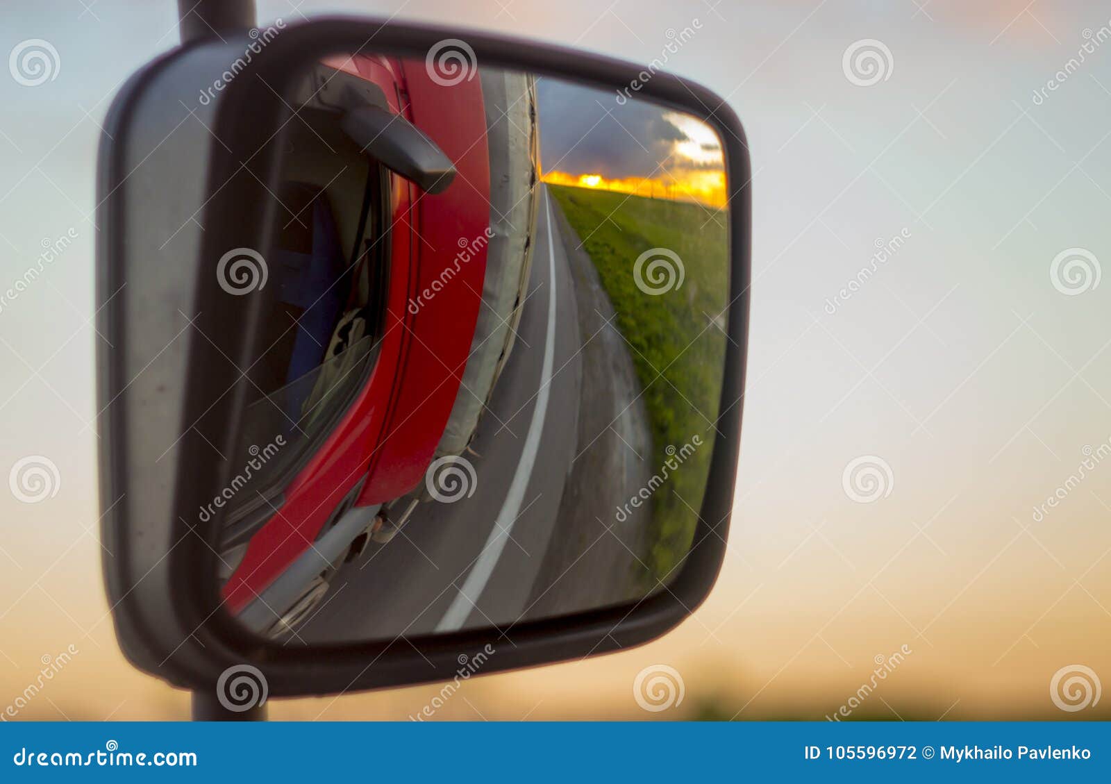 Reflections of the Sunset in the Rearview Mirror of the Truck Stock ...