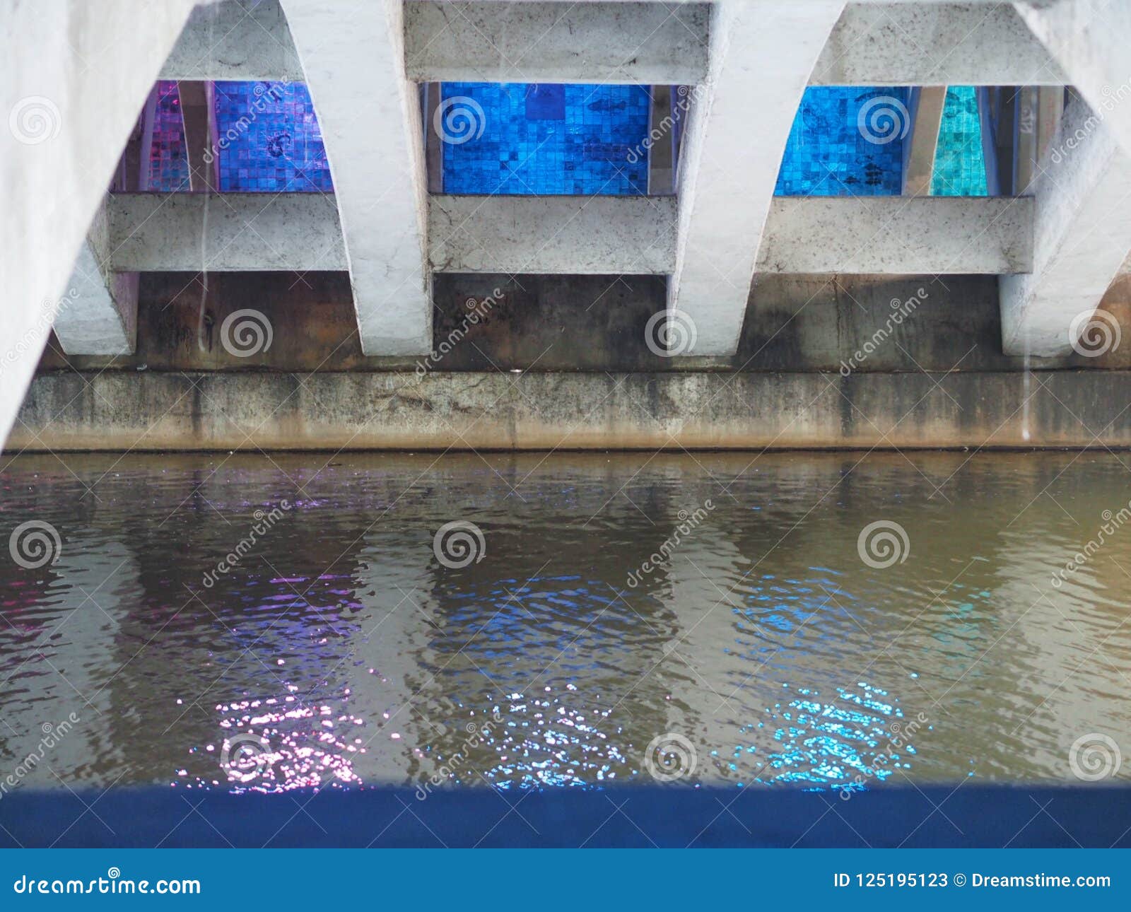 Reflections in underpass stock image. Image of river - 125195123