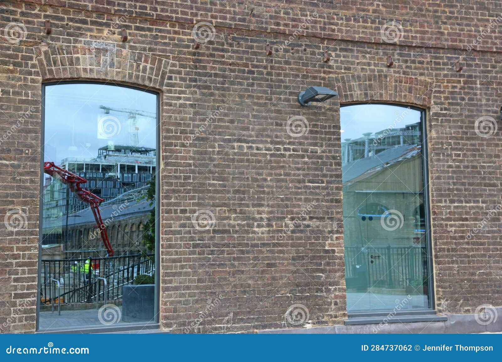 Reflections in a Warehouse Window Stock Photo - Image of crane, window ...