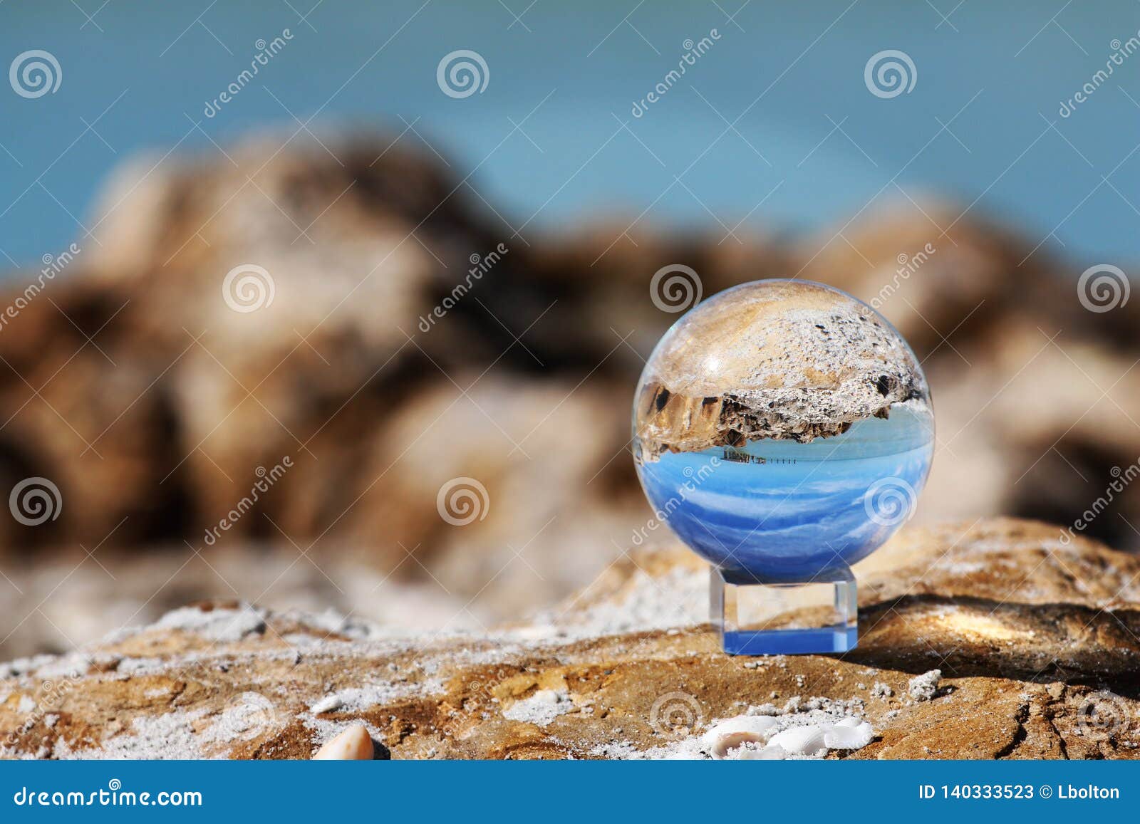 Reflective Ball with Sea and Rocks Stock Image - Image of seas, clouds ...
