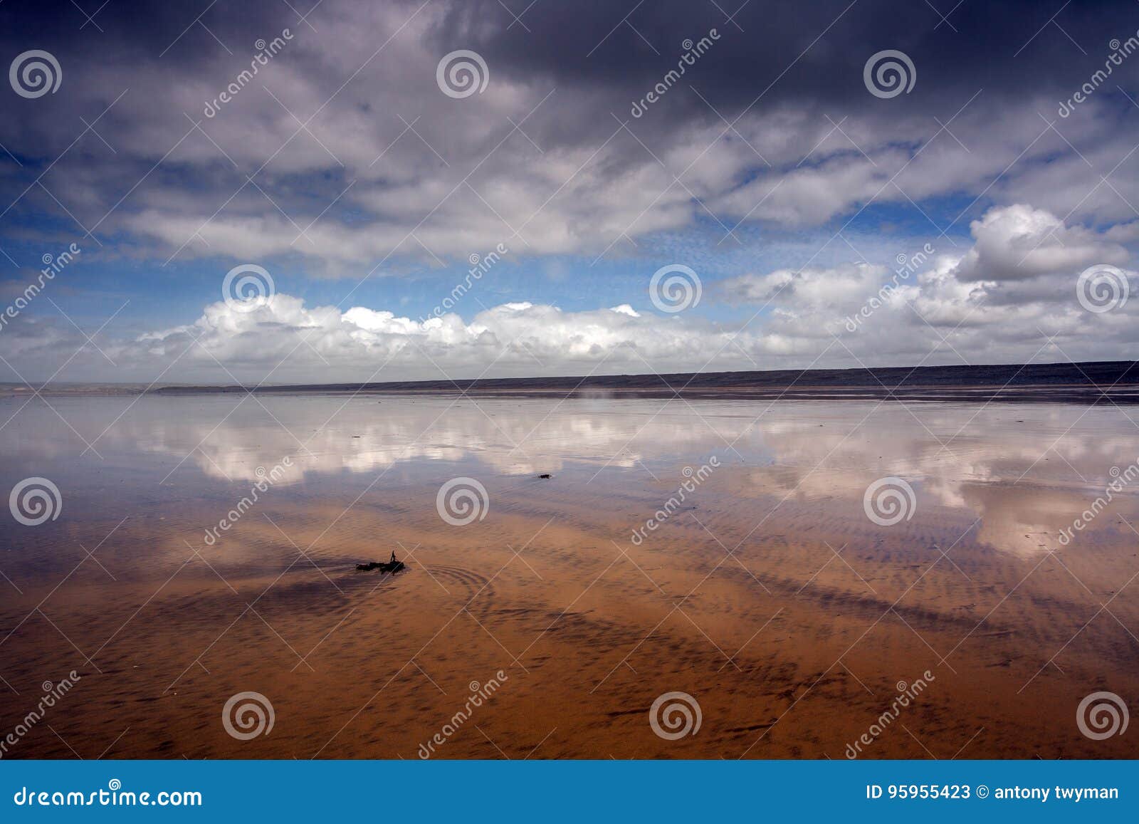 Reflective Beach Scene at Westward Ho! Stock Image - Image of ...