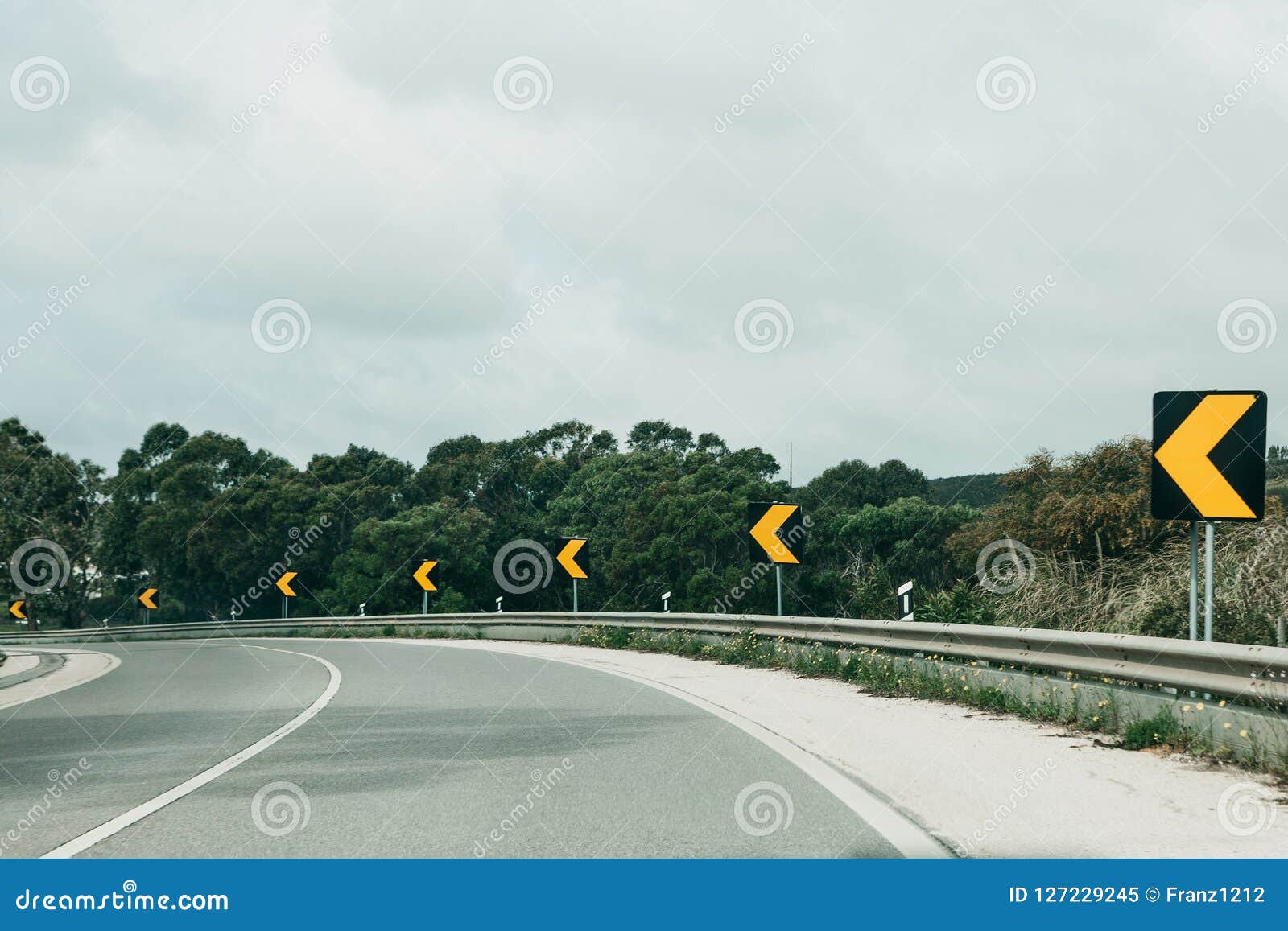 Reflective Direction Indicators on the Road. Stock Image - Image of ...