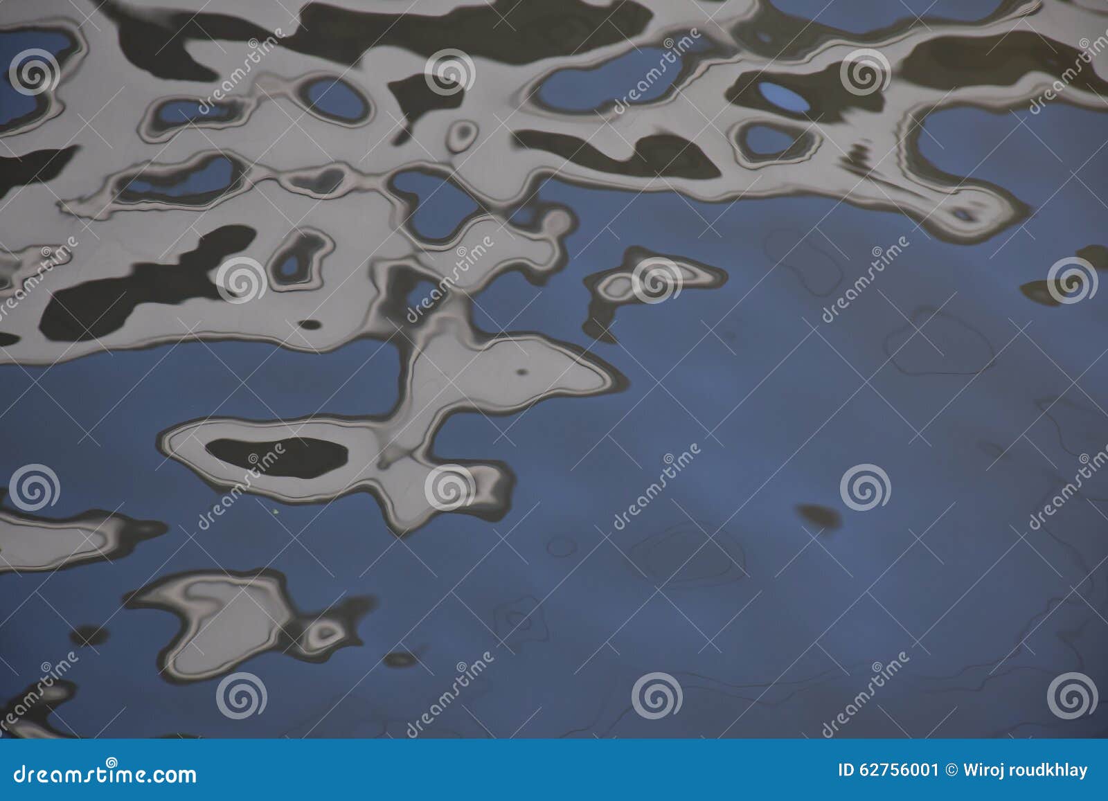 Reflective Light Image Description: Rippled Reflections on the Water ...