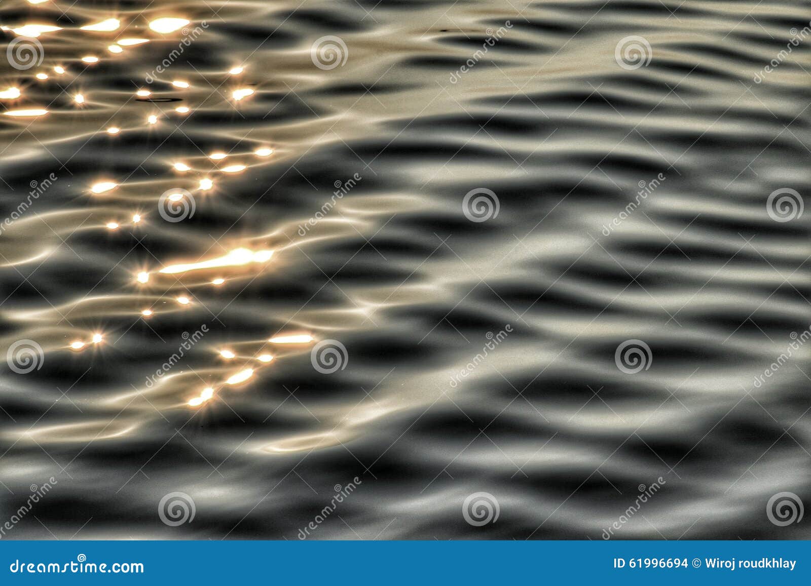 Reflective Light Image Description: Rippled Reflections on the Water ...