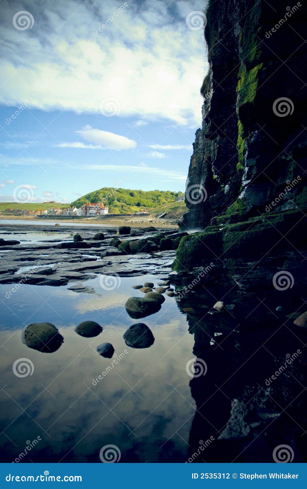 Reflective Rocks stock photo. Image of cast, rocks, shore - 2535312