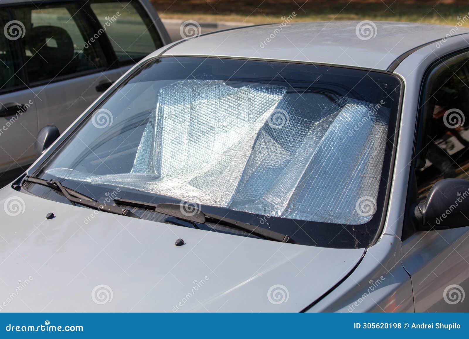 Reflective Sun Protection on Car Windshield Stock Photo - Image of ...