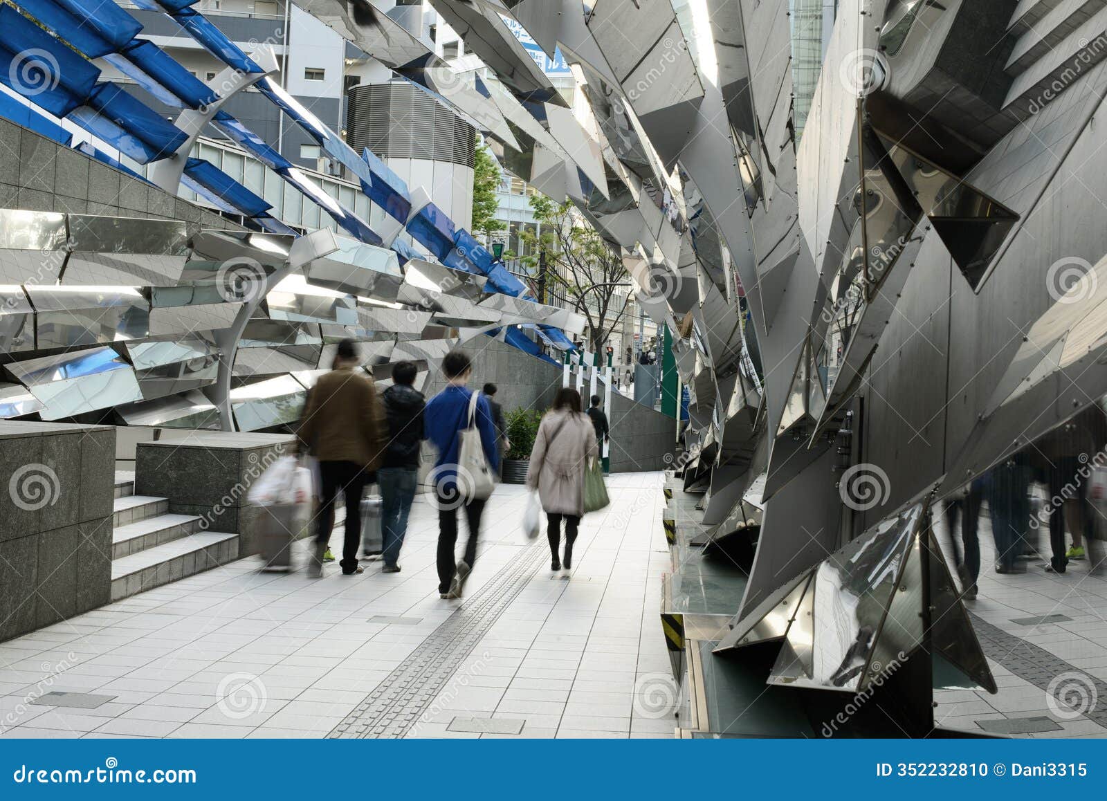 Reflective Metal Sculpture Bird Editorial Photo | CartoonDealer.com ...