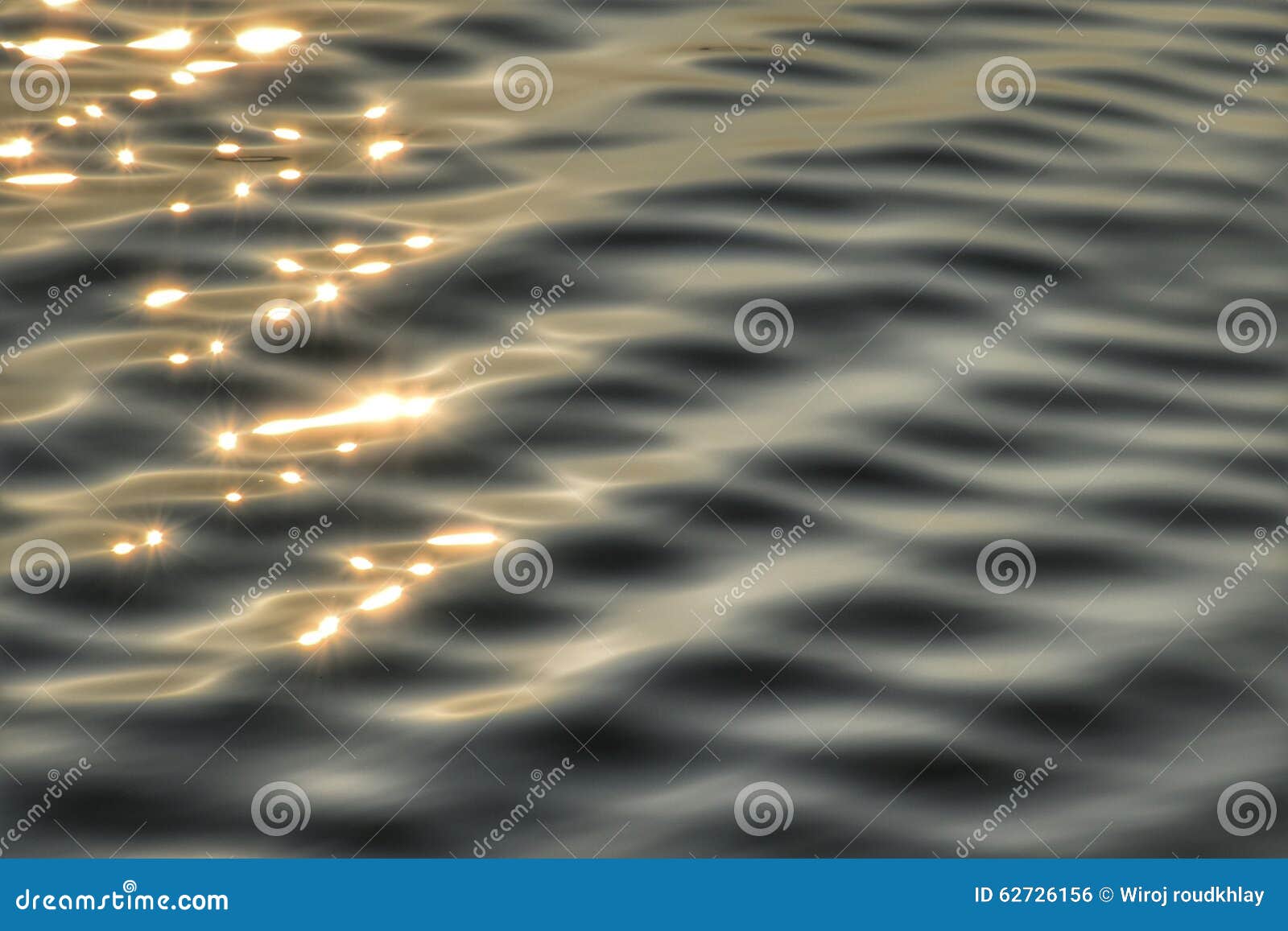Reflective Image Description: Rippled Reflections on the Water. this is ...