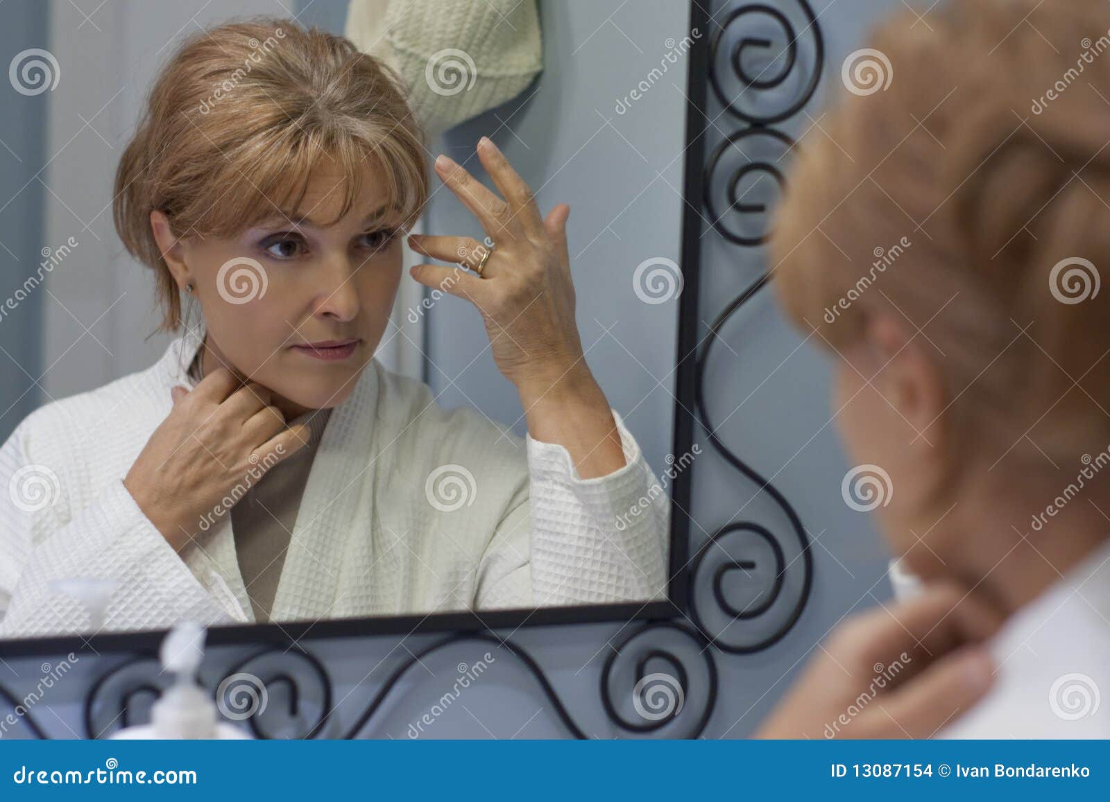 Reflexion of Woman Looking in Mirror Stock Photo - Image of person ...