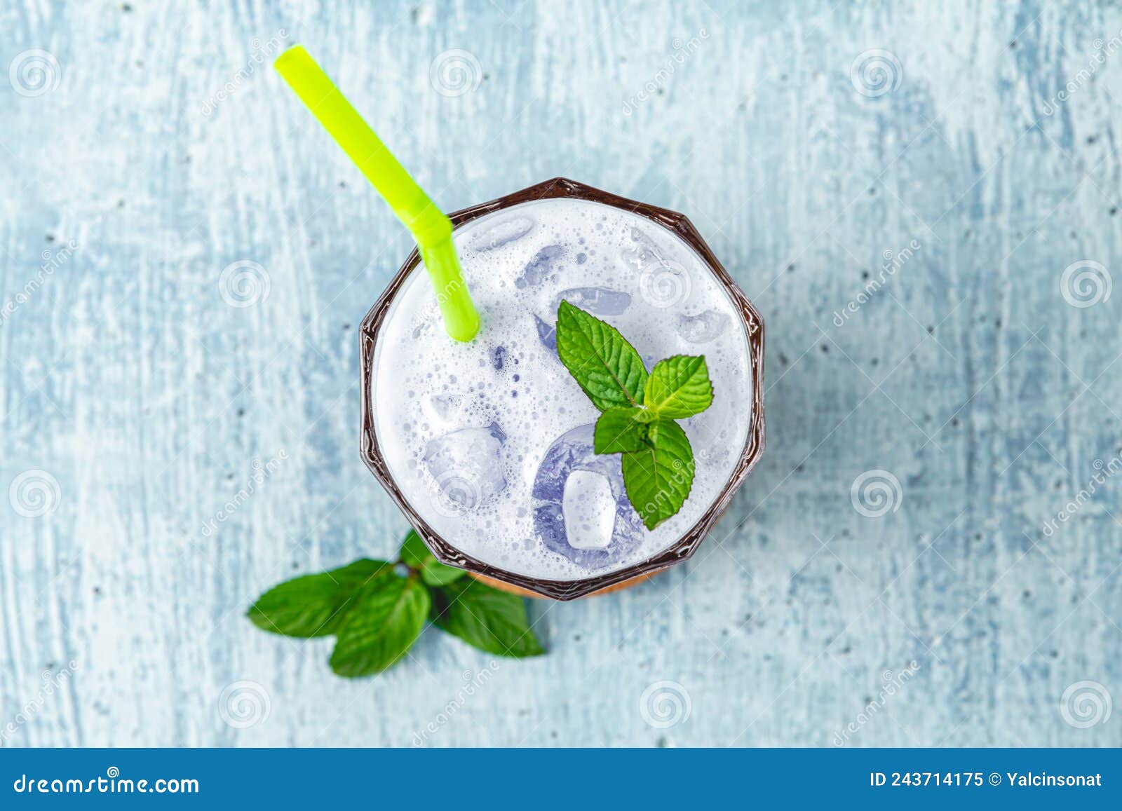 Refreshing Blue Coconut Cocktail on Blue Stone Background Stock Image ...