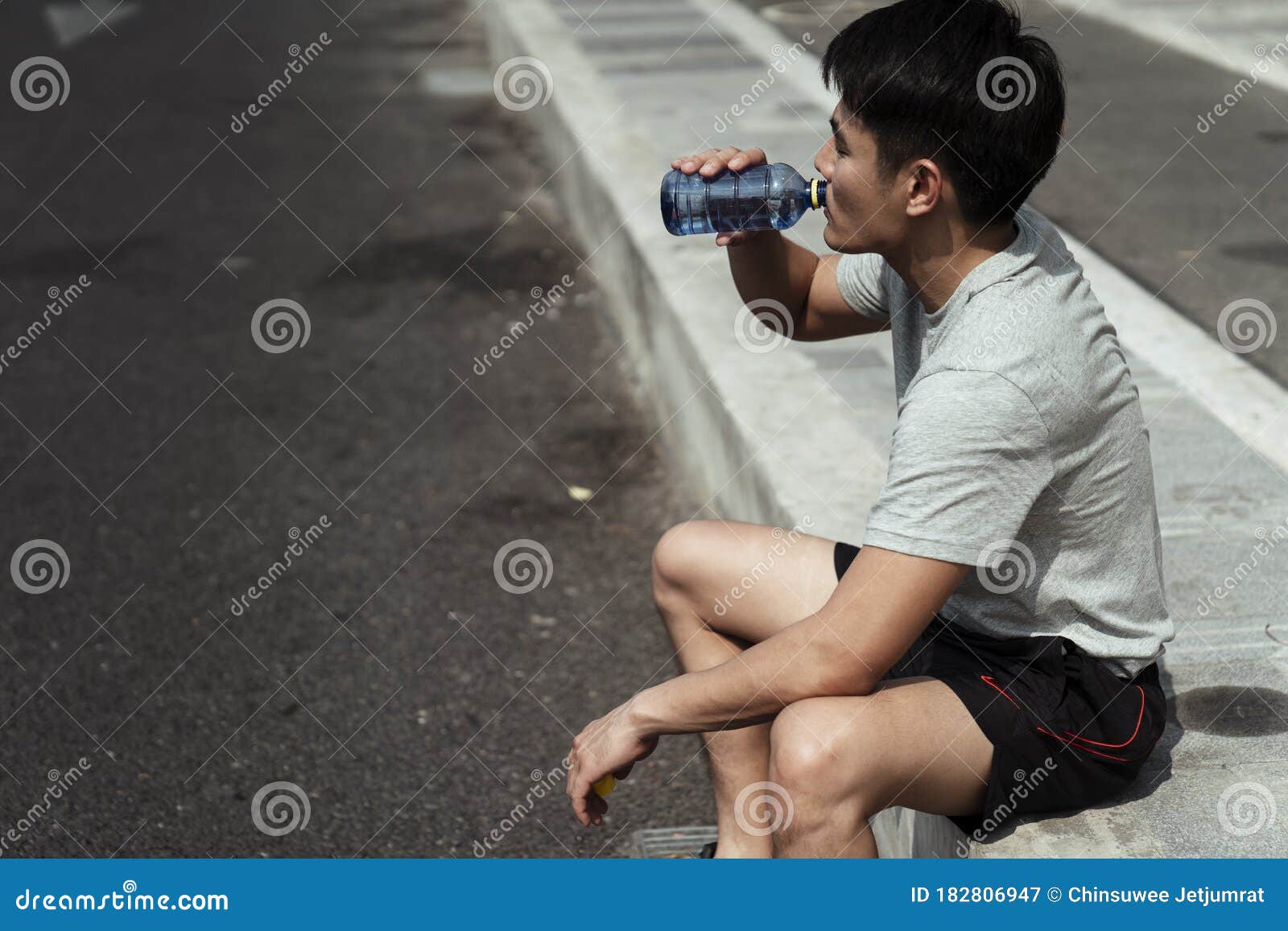 Refreshing after exhausted stock image. Image of muscular - 182806947