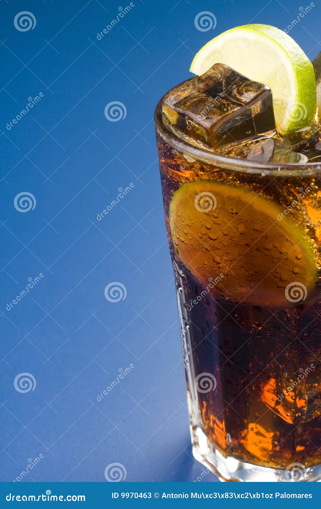 Refreshing Glass of Cola with Lemon and Ice Stock Image - Image of cube ...