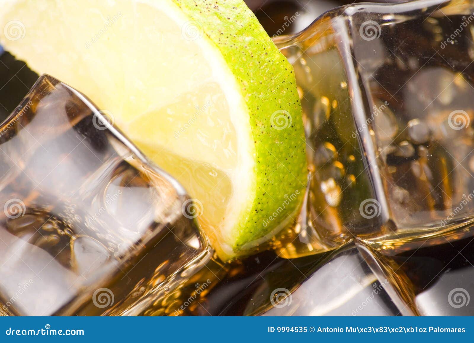 Refreshing Glass of Cola with Lemon and Ice Stock Image - Image of ...