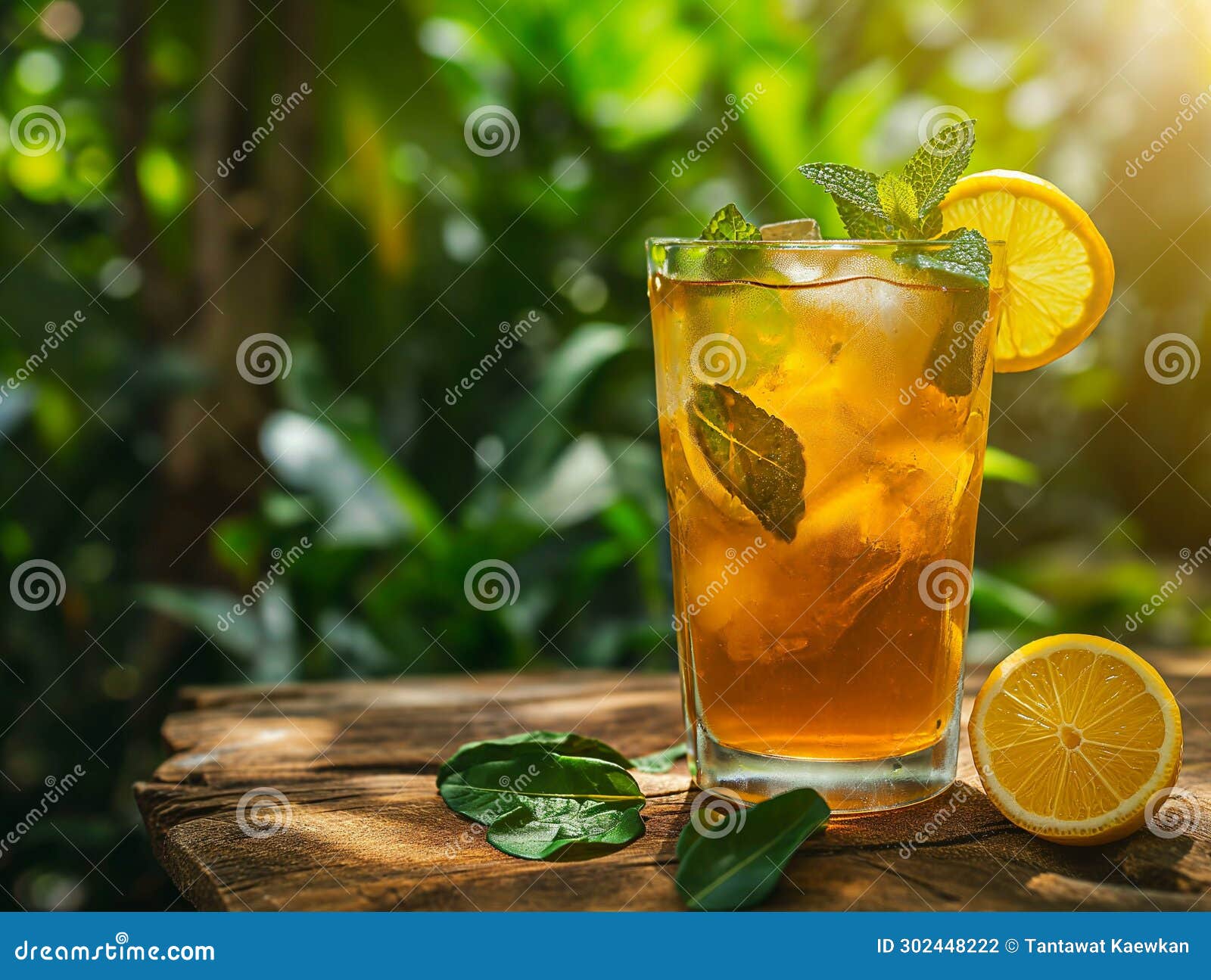 A Refreshing Glass of Lemon Mint Iced Tea on a Rustic Tabletop Stock ...