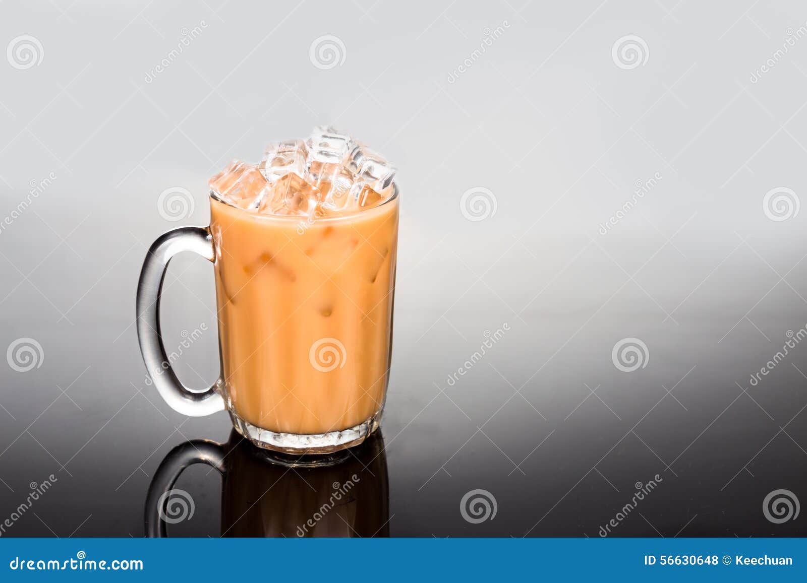 Refreshing Ice Cold Tea with Milk in Transparent Glass Stock Photo ...
