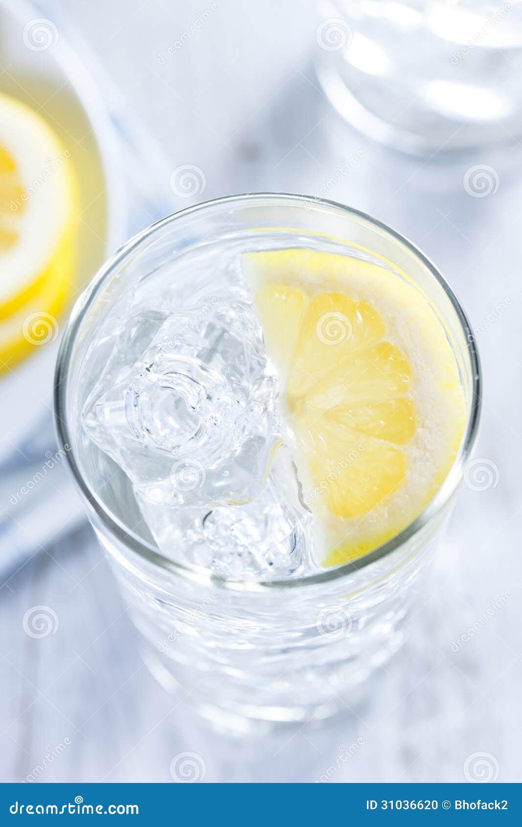 Refreshing Ice Cold Water with Lemon Stock Photo - Image of refreshing ...