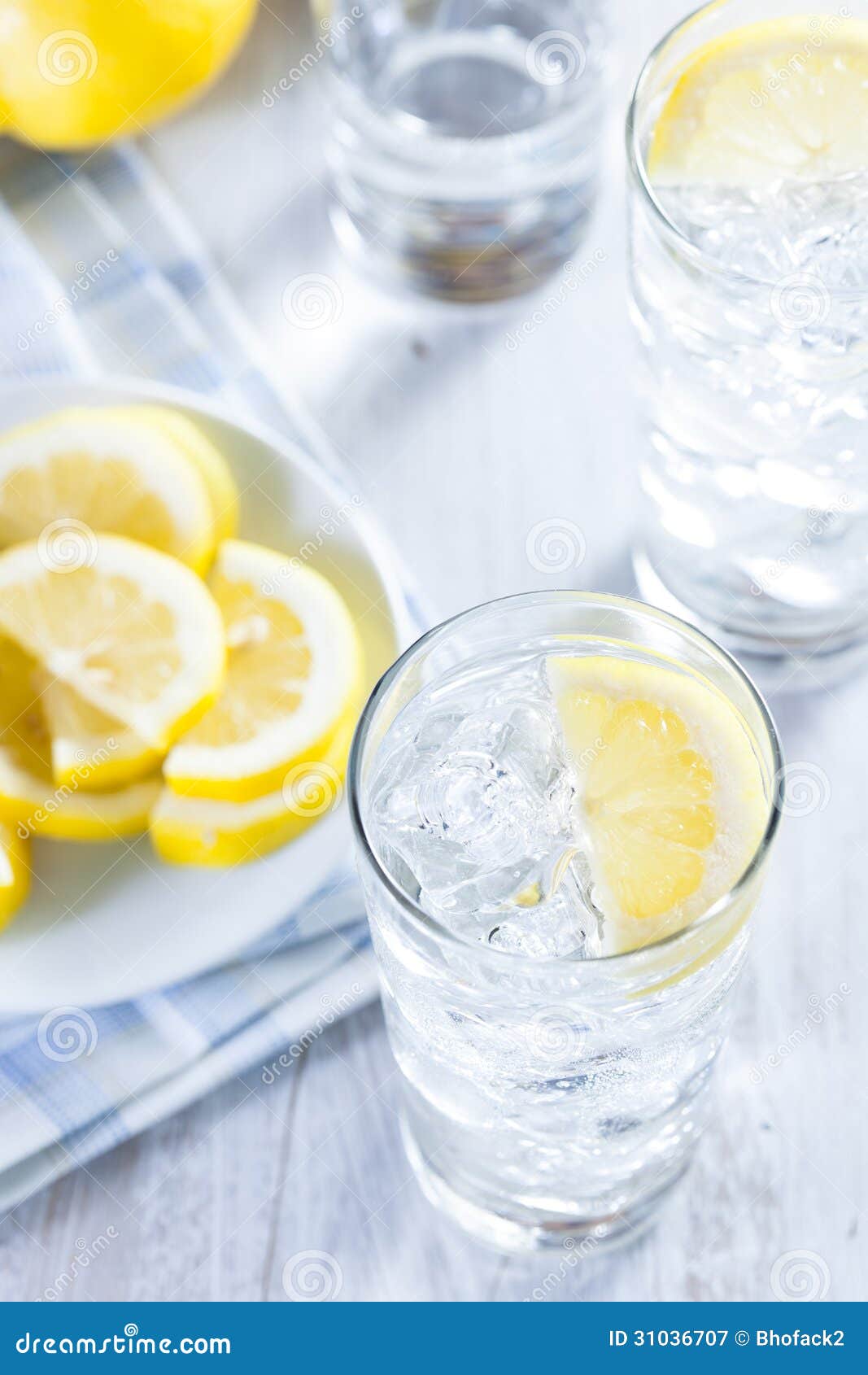 Refreshing Ice Cold Water with Lemon Stock Image - Image of clear ...