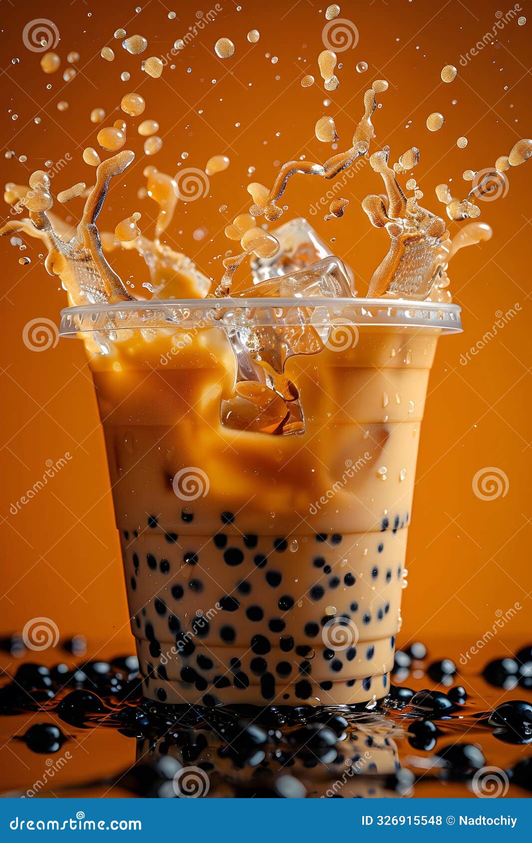 Refreshing Iced Bubble Tea Splash with Tapioca Pearls Stock Photo ...