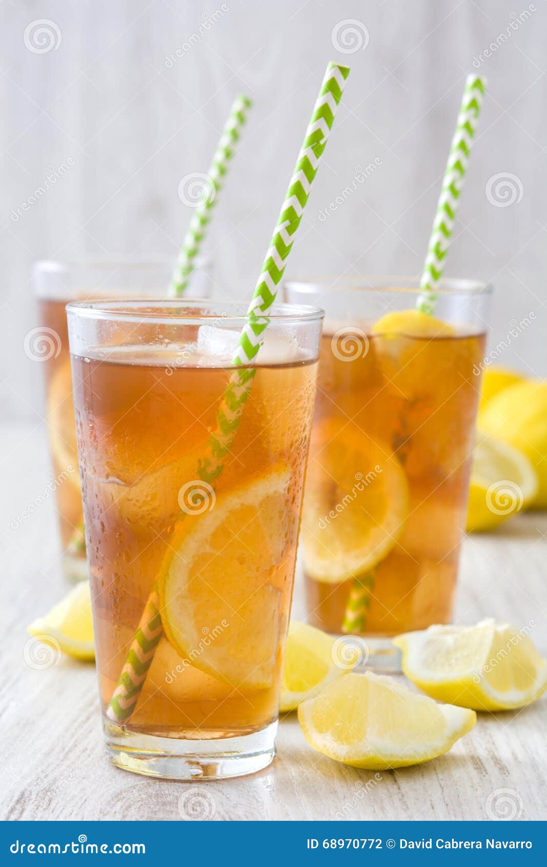 Refreshing Iced Tea with Lemon on White Wood Stock Photo - Image of ...