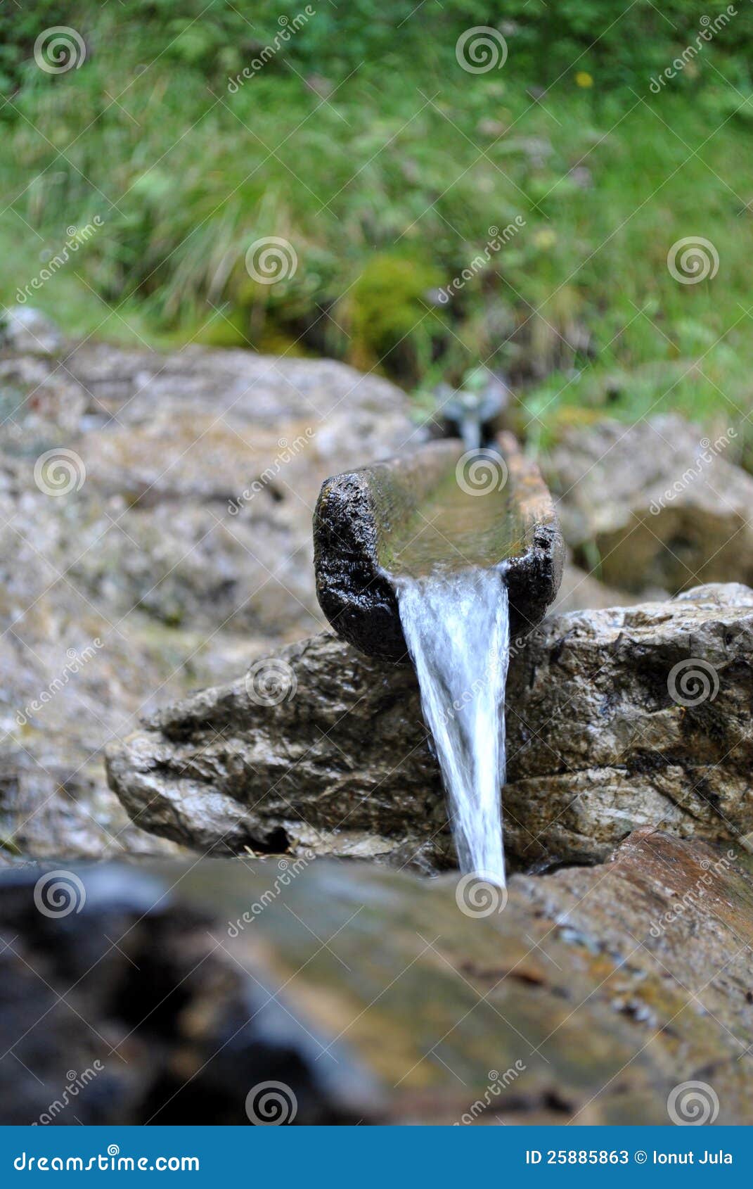 Refreshing mountain spring stock image. Image of fluid - 25885863