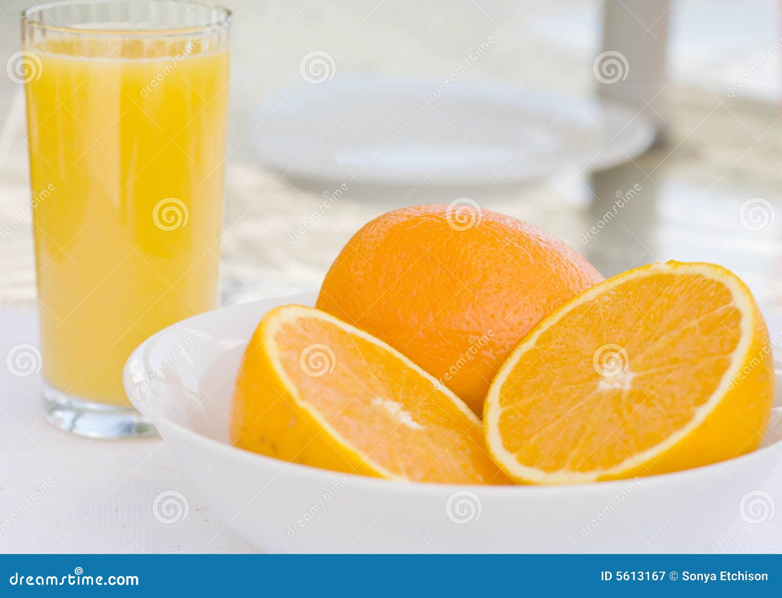 Refreshing Oranges and Juice Stock Image - Image of slice, table: 5613167