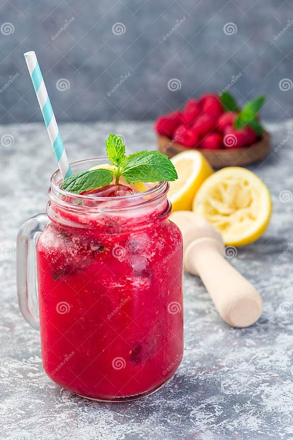 Refreshing Raspberry, Lemon and Mint Lemonade with Sparkling Water in a ...