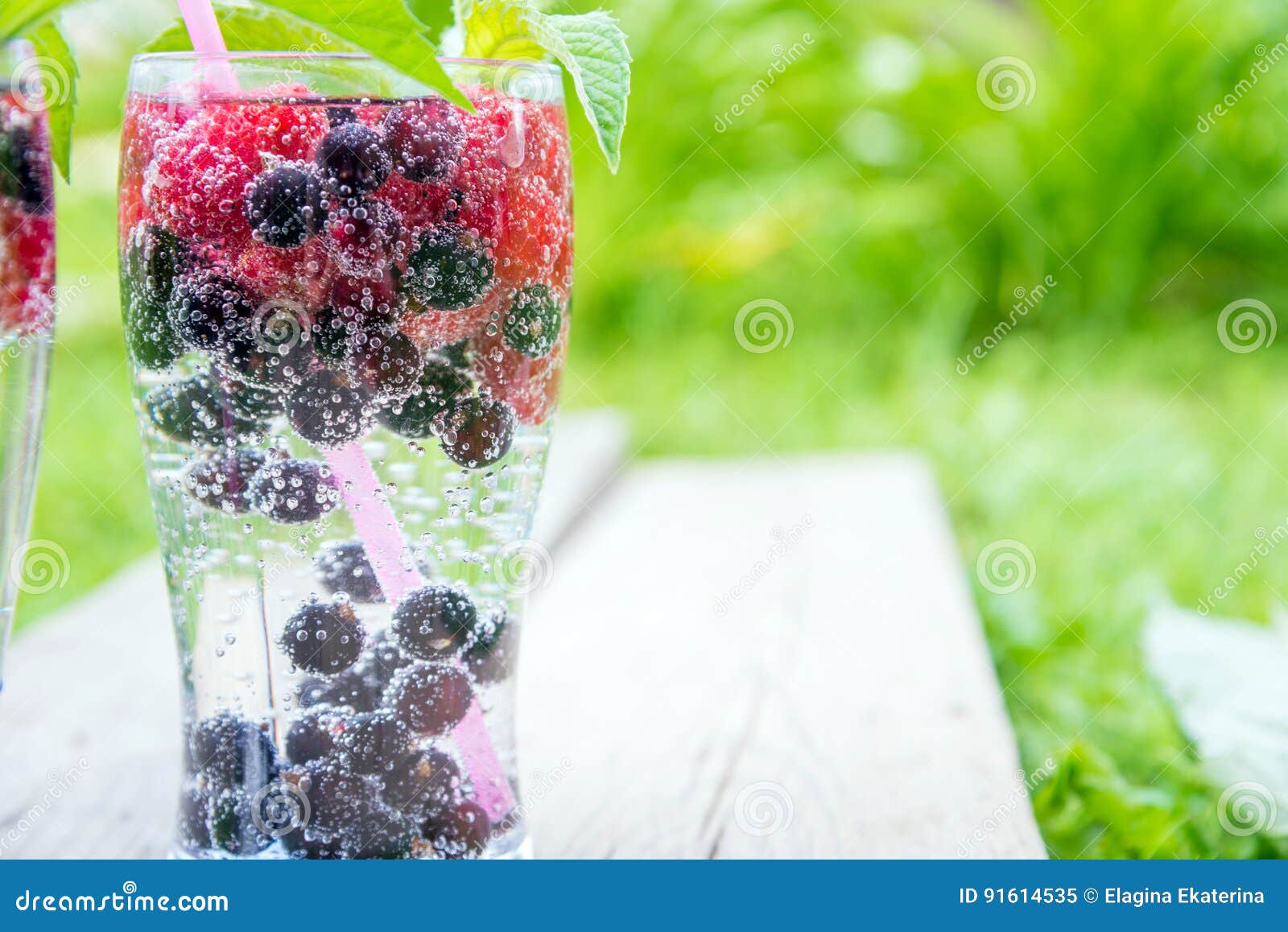 Refreshing Summer Drink with Sparkling Water and Fresh Berries Stock ...