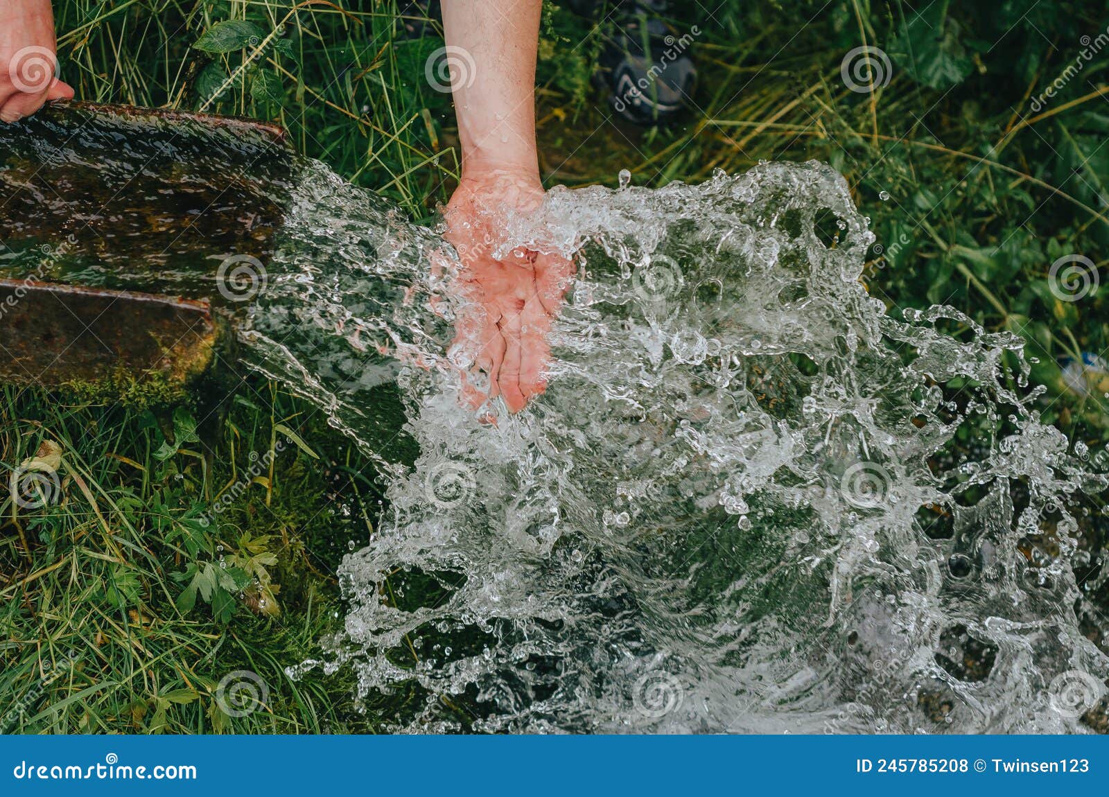 Refreshment with Cold Clean Water on a Hot Summer Day. the Flow of ...