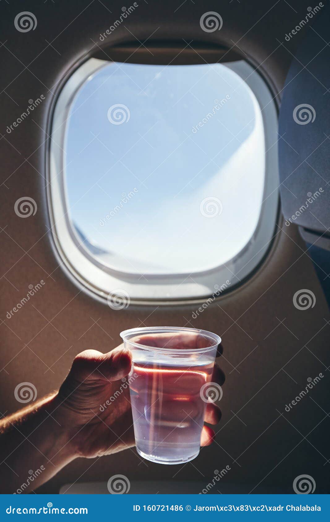 Refreshment during flight stock photo. Image of cabin - 160721486