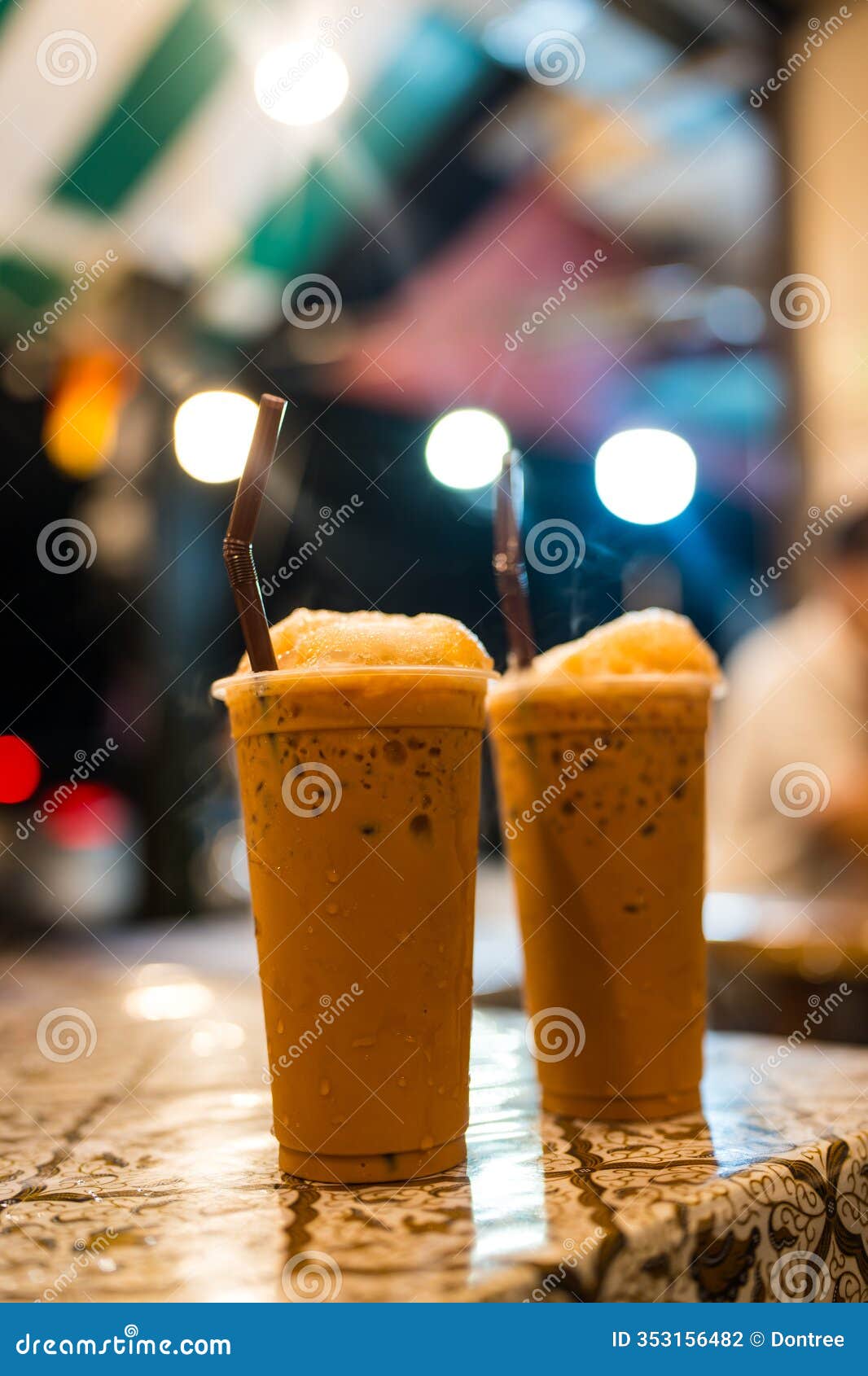 Refreshment and Two Take Away Iced Milk Tea with Straw in Plastic Cup ...