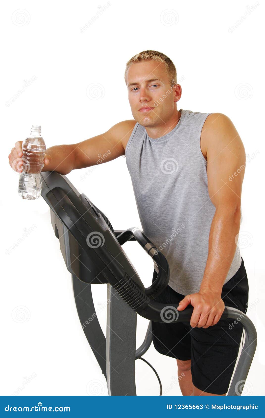 Refreshment after workout stock image. Image of muscular - 12365663