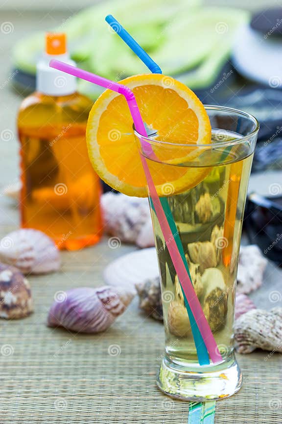 Refreshments on the beach stock photo. Image of bottle - 25271232