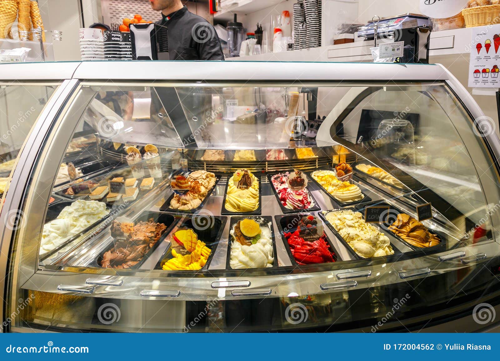 Refrigerated Display Case with a Large Assortment of Soft Ice Cream in ...