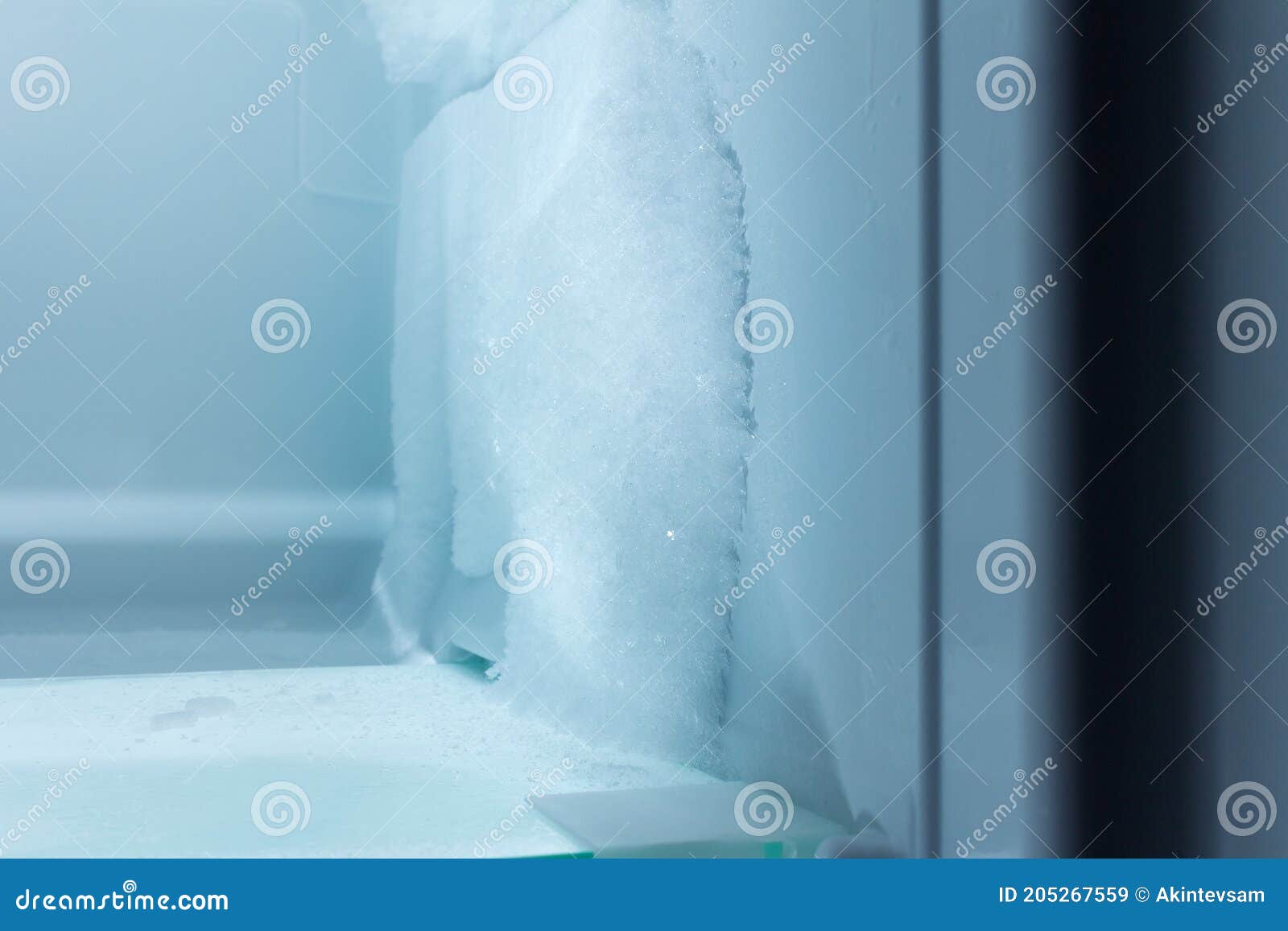 Defrosting The Freezer. Extremely Frozen Freezer Full Of Ice. Stock ...