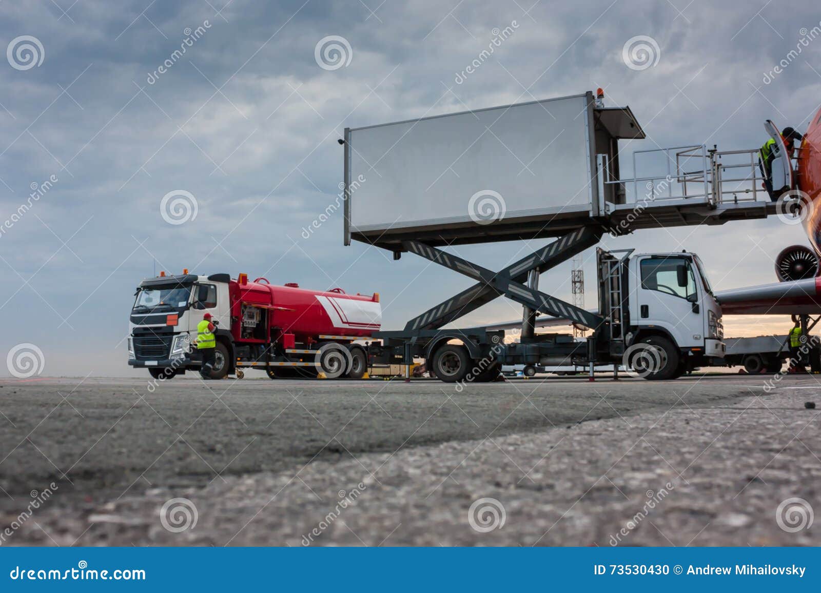 Refueling and Loading Food on the Airplane Stock Photo - Image of ...