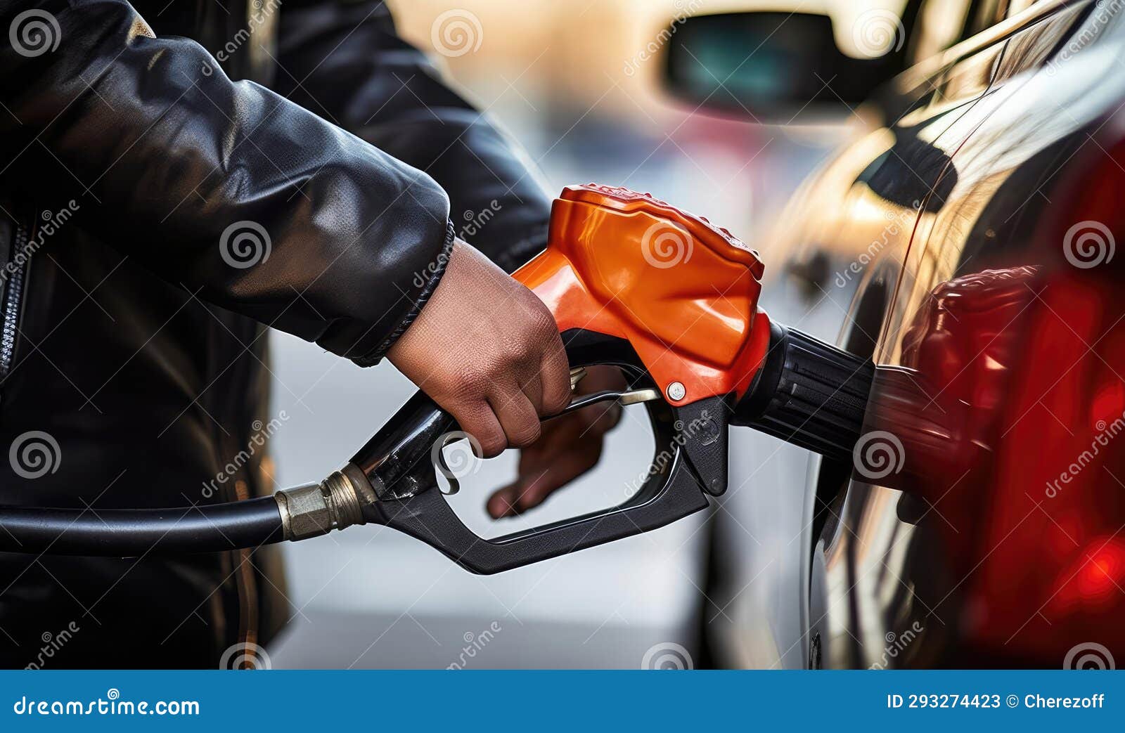 The Refueling Nozzle is Inserted into the Tank of the Vehicle Stock ...