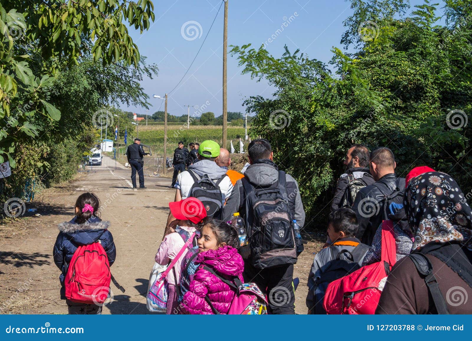 Refugee Migrants Facing The Croatian Police Whill Crossing The Serbia
