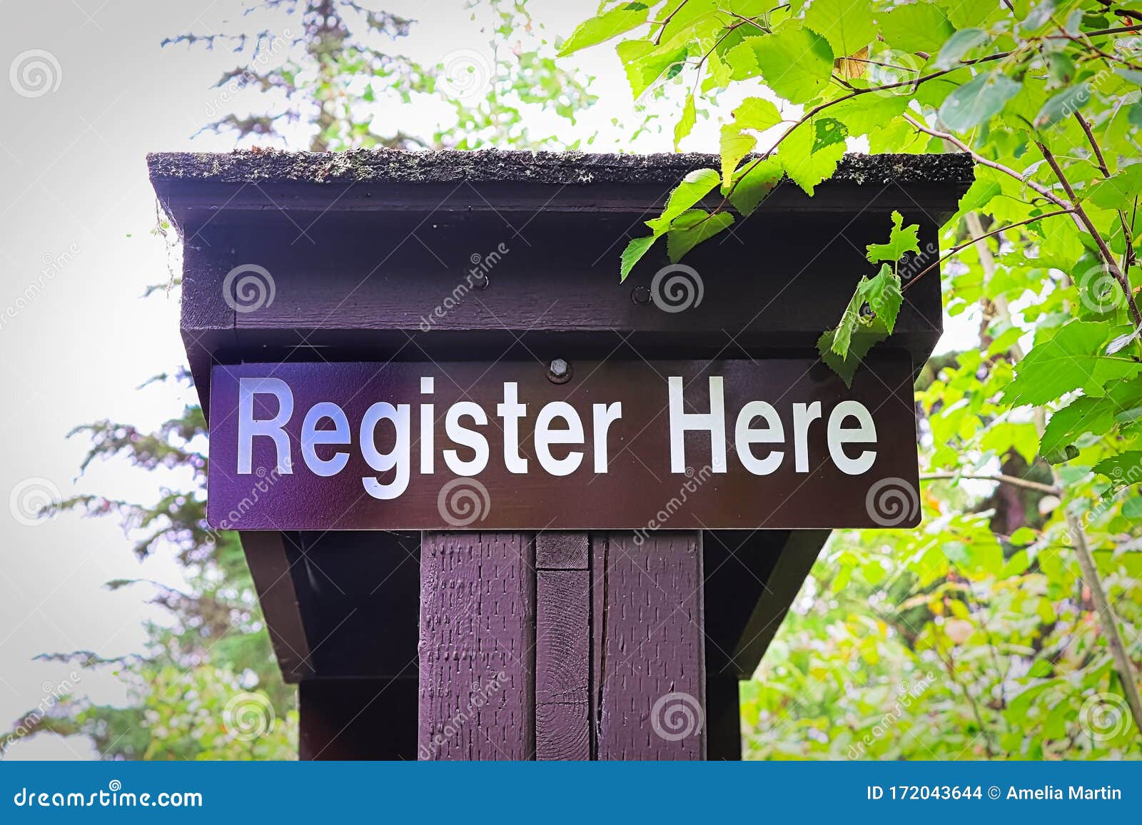 A Register Here Information Sign on a Post Stock Photo - Image of ...