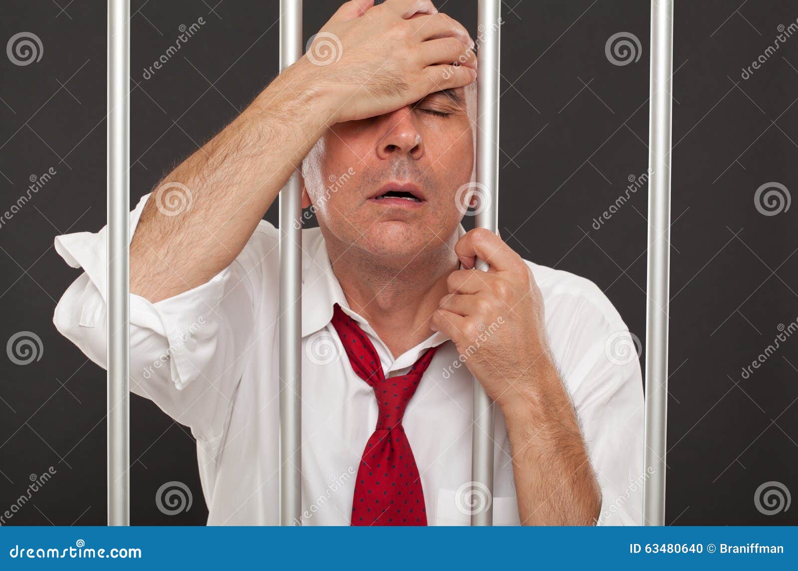 Regretful Businessman in Prison Stock Photo - Image of guilt, asking ...