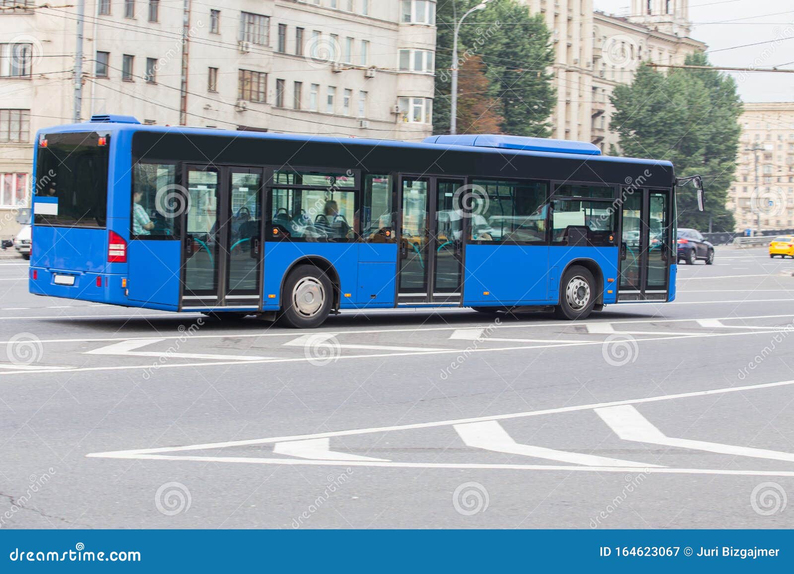 Regular Bus Moving Down the Street Stock Image - Image of ride, tourist ...